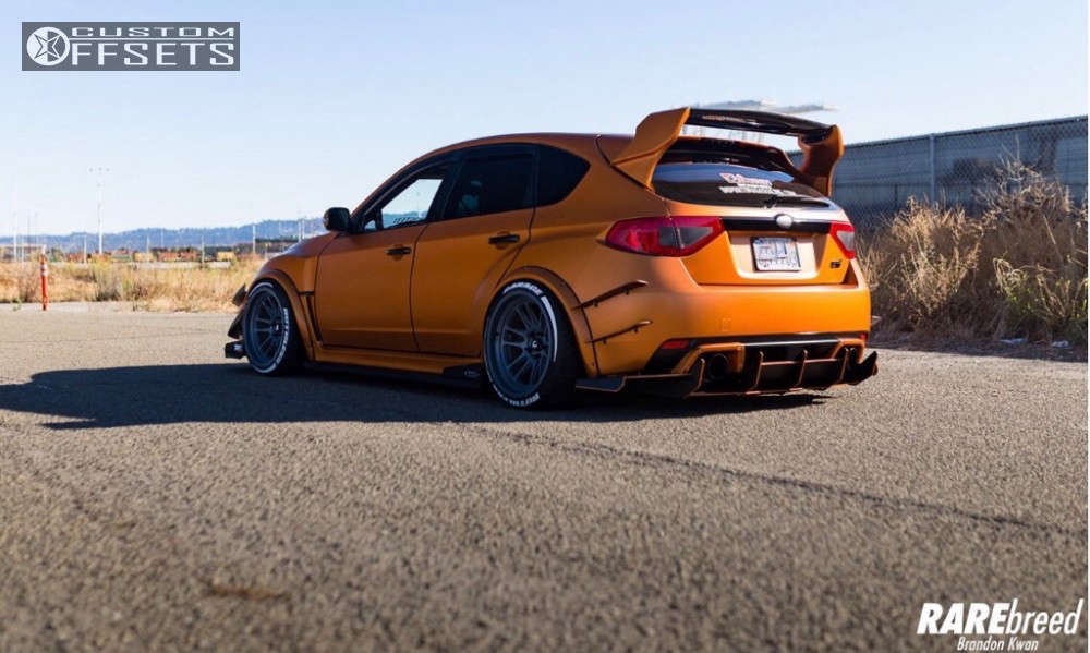 2011 Subaru WRX STI with 18x11 8 Cosmis Racing XT-206R and 285/30R18 ...