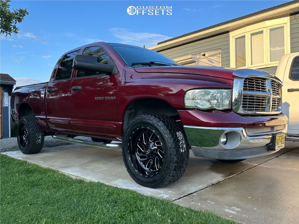 2002 Dodge Ram 1500 with 20x10 -18 Fuel Triton and 275/55R20 General ...