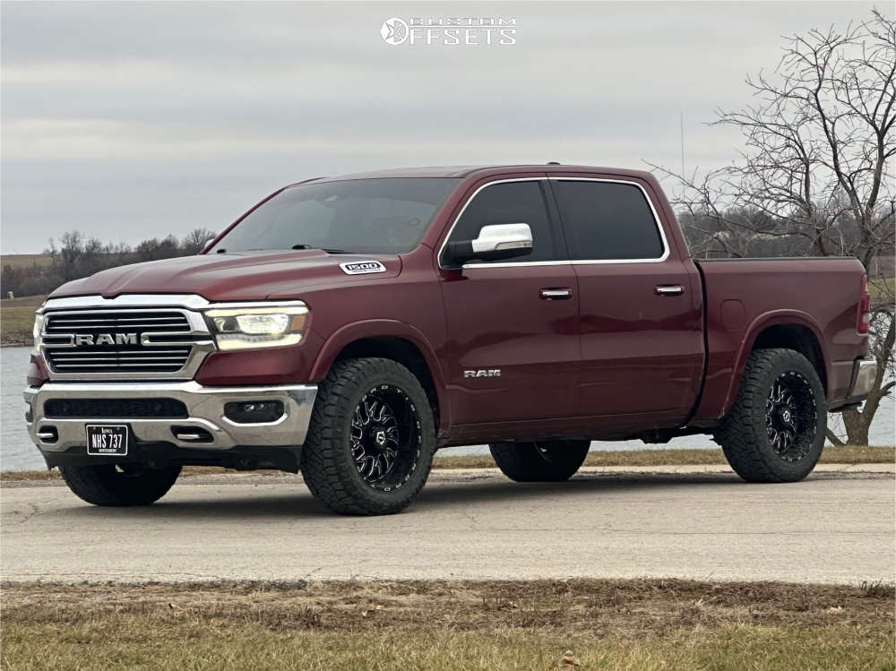 2021 Ram 1500 with 20x10 -25 TIS 544bm and 33/11.5R20 Nitto Ridge ...
