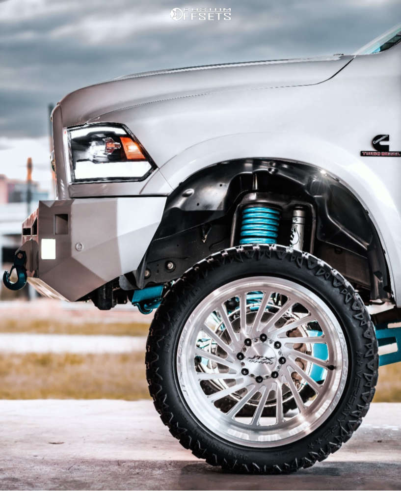 2017 Ram 2500 with 24x14 -76 JTX Forged Credo and 36/14.5R24 Versatyre ...