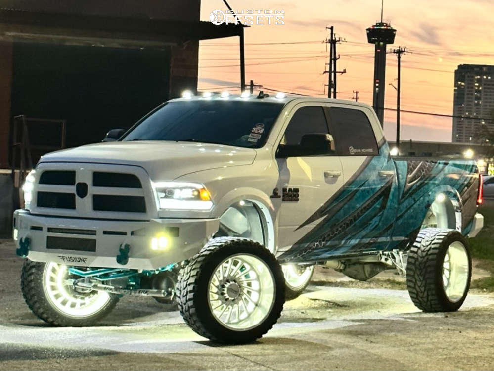 2017 Ram 2500 with 24x14 -76 JTX Forged Credo and 36/14.5R24 Versatyre ...