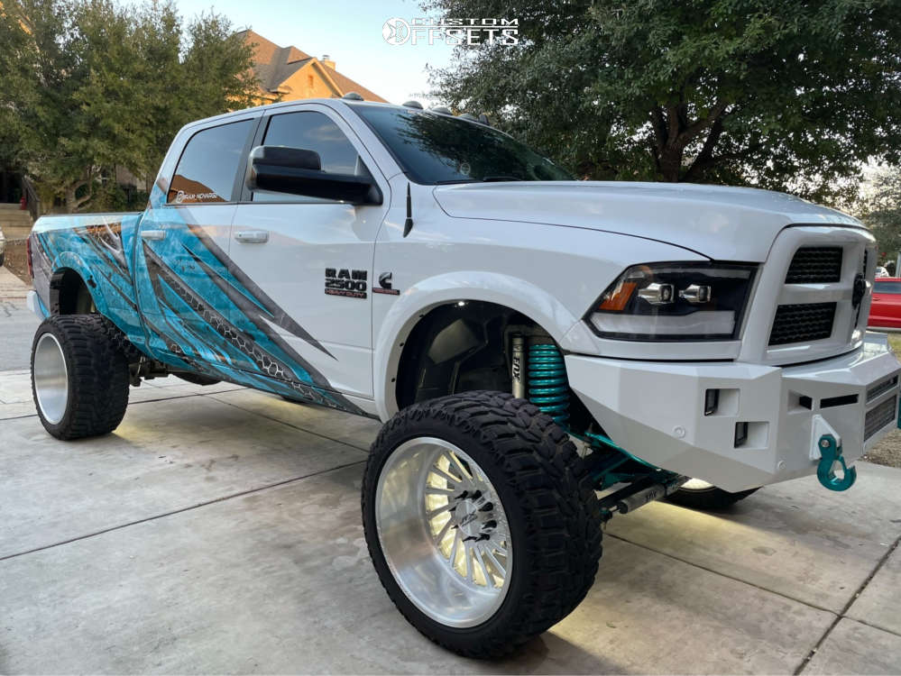 2017 Ram 2500 with 24x14 -76 JTX Forged Credo and 36/14.5R24 Versatyre ...