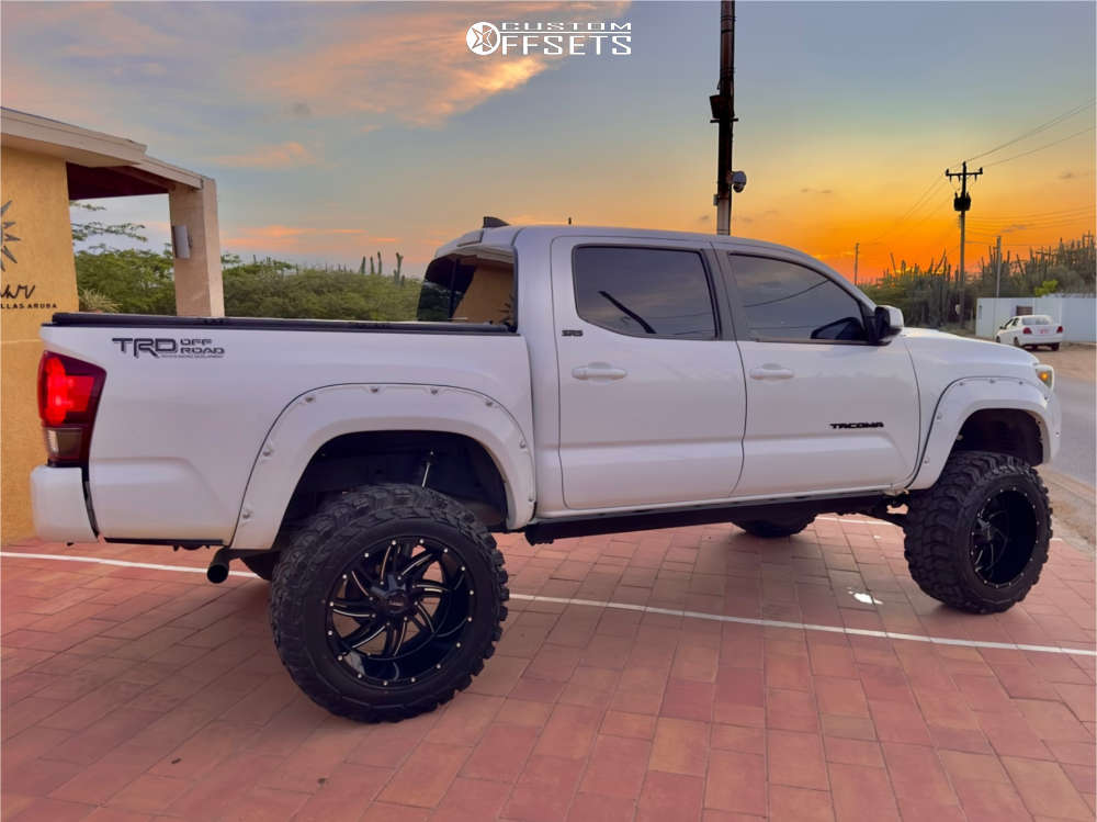 2019 Toyota Tacoma with 20x12 -44 Savage Offroad Sa17 and 35/12.5R20 Gladiator Xcomp Mt and ...