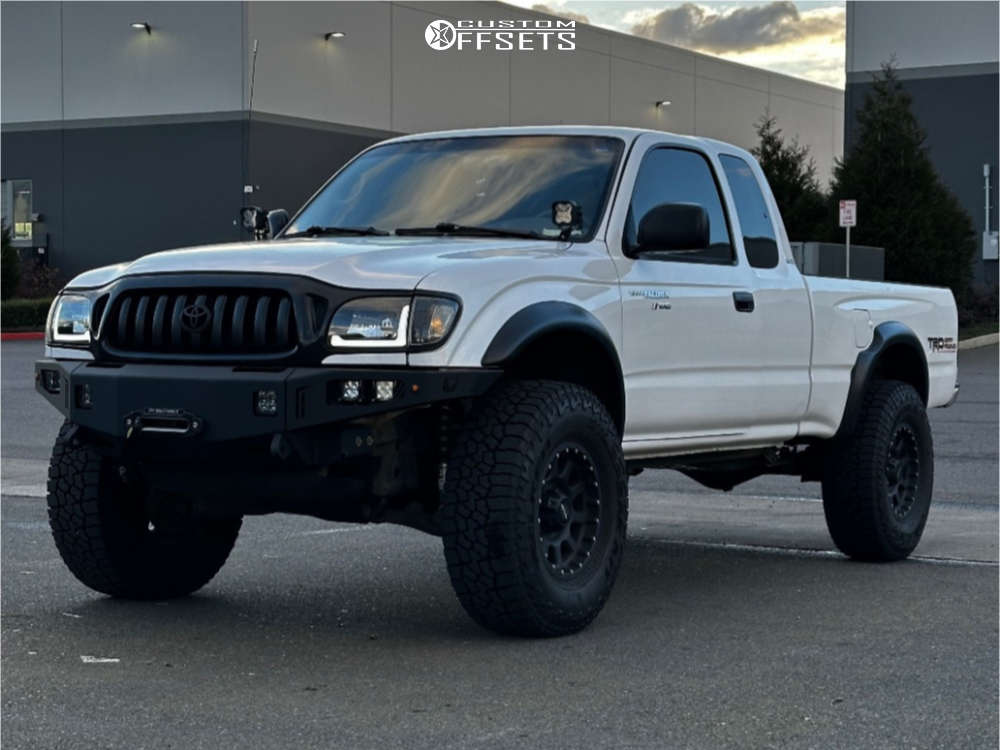 2004 Toyota Tacoma with 16x8 0 Pro Comp Series 32 and 285/75R16 Falken ...