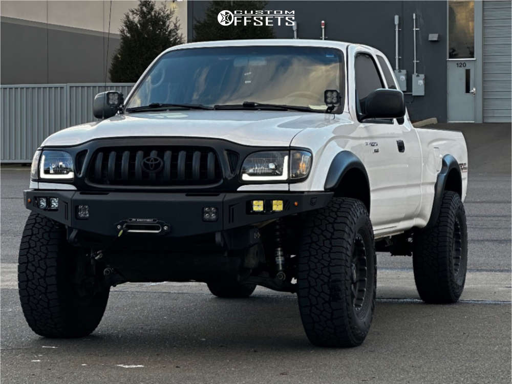 2004 Toyota Tacoma with 16x8 0 Pro Comp Series 32 and 285/75R16 Falken ...