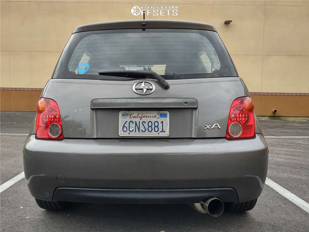 2005 Scion XA with 15x7 35 Enkei Rpf1 and 205/55R15 Yokohama Advan ...