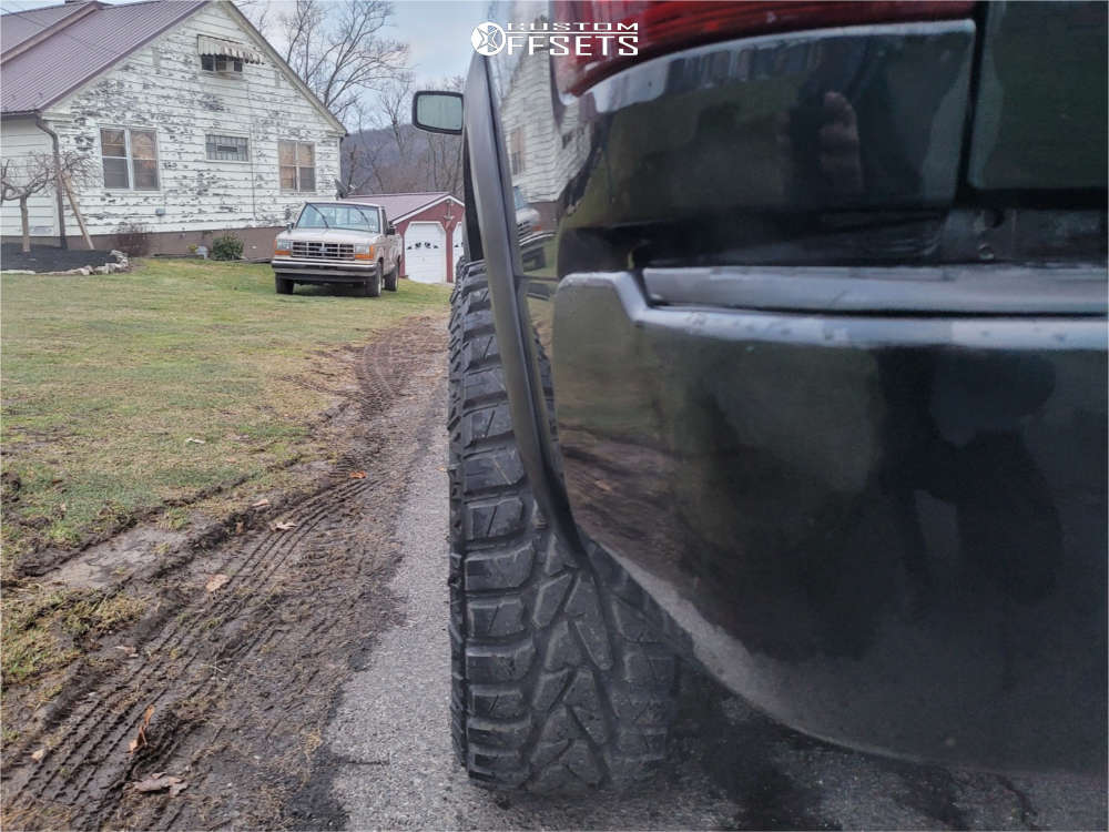 2017 Ram 1500 with 20x10 -18 XD Xd856 and 35/12.5R20 Versatyre MXT and ...