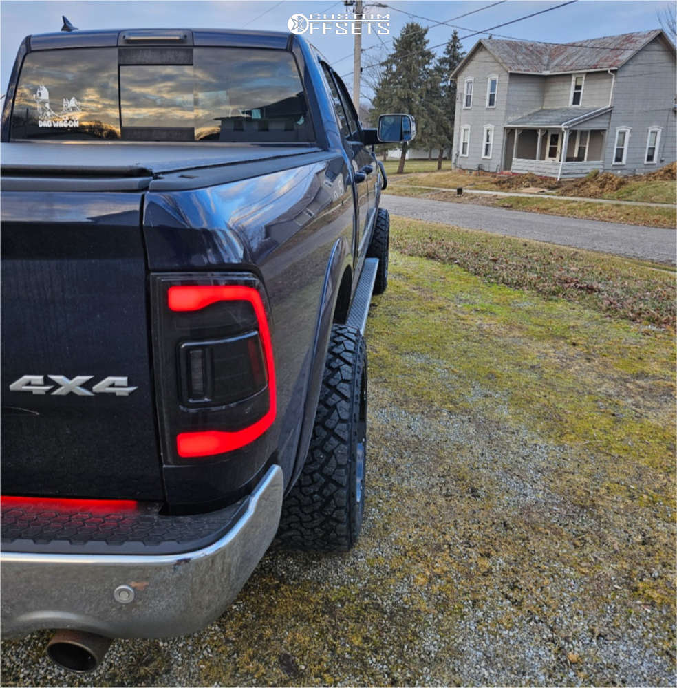 2014 Ram 1500 with 20x12 -51 Vision Prowler and 33/12.5R20 Venom Power ...