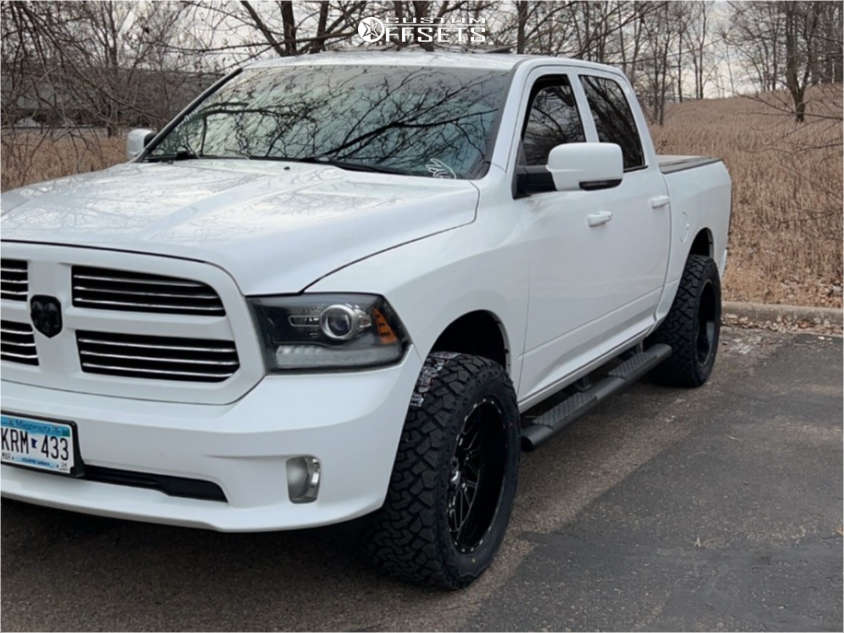 2014 Ram 1500 with 20x10 -25 Vision Brawl and 33/12.5R20 Venom Power ...