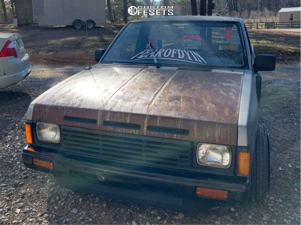 1986 Nissan D21 with 15x10 -43 American Racing Baja and 195/50R15 ...