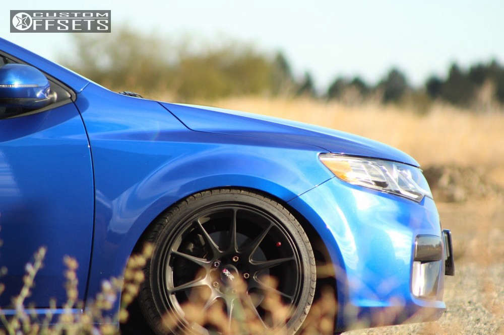 2011 Kia Forte Koup with 17x8.25 35 XXR 527 and 205/40R17 Lexani Lxuhp ...