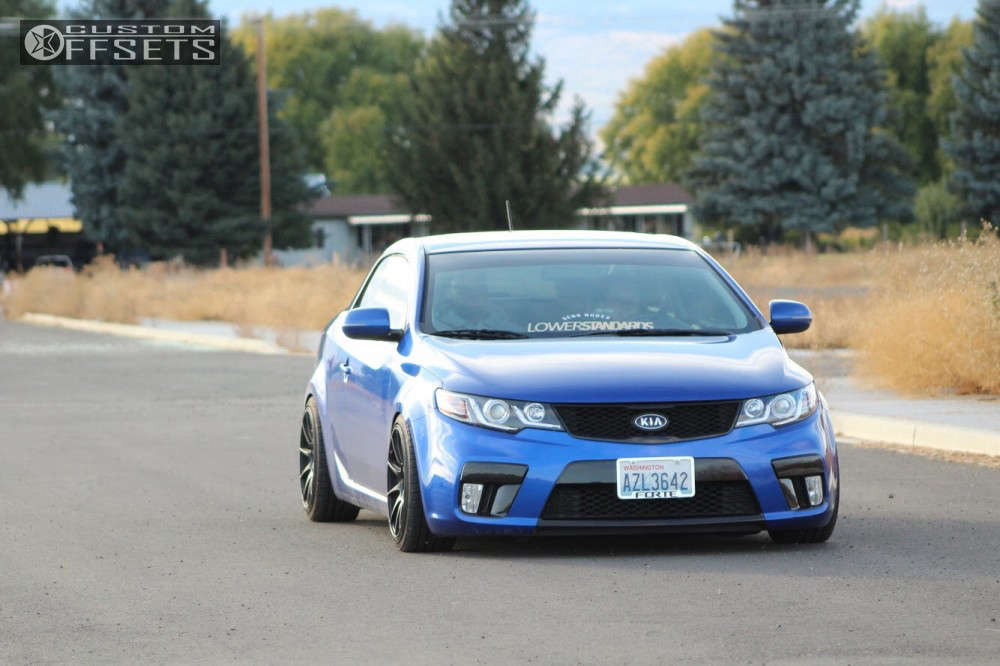 2011 Kia Forte Koup with 17x8.25 35 XXR 527 and 205/40R17 Lexani Lxuhp ...