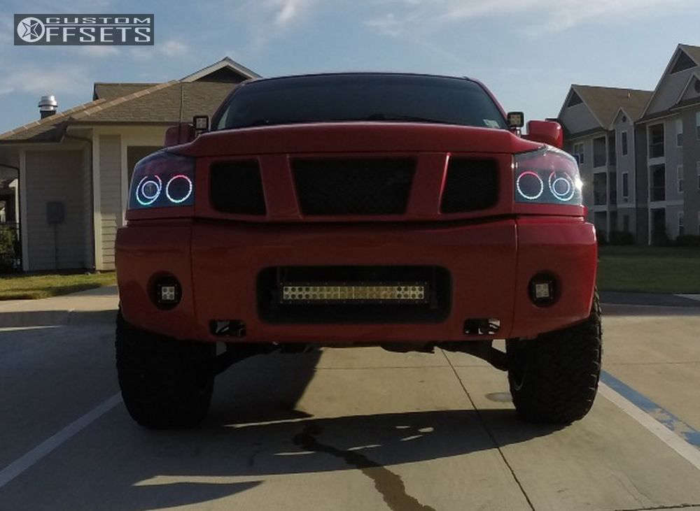 2006 Nissan Titan with 18x12 -44 Fuel Maverick and 285/65R18 Nitto Trail Grappler and Suspension ...