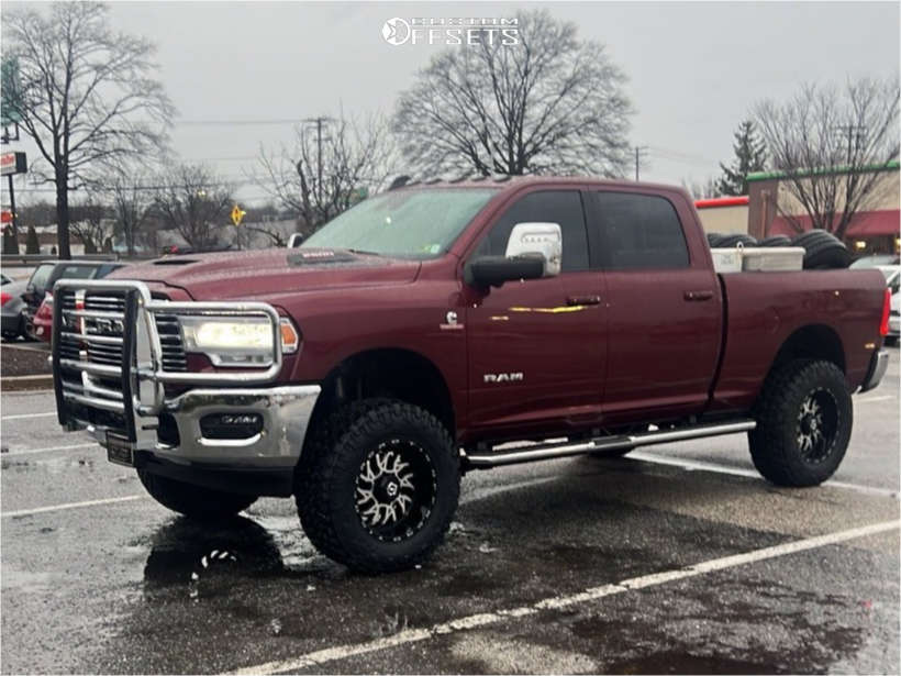 2023 Ram 2500 with 20x10 -25 TIS 544mb and 37/12.5R20 Nitto Trail ...