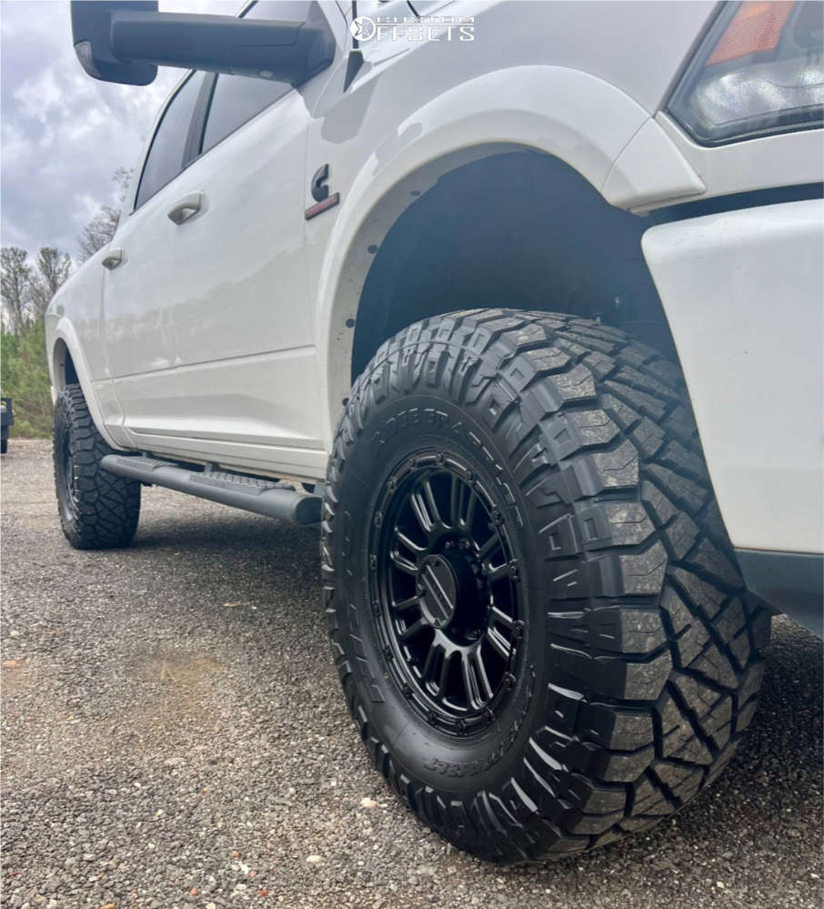 2018 Ram 2500 with 18x9 18 Raceline Compass and 37/13.5R18 Nitto Ridge ...