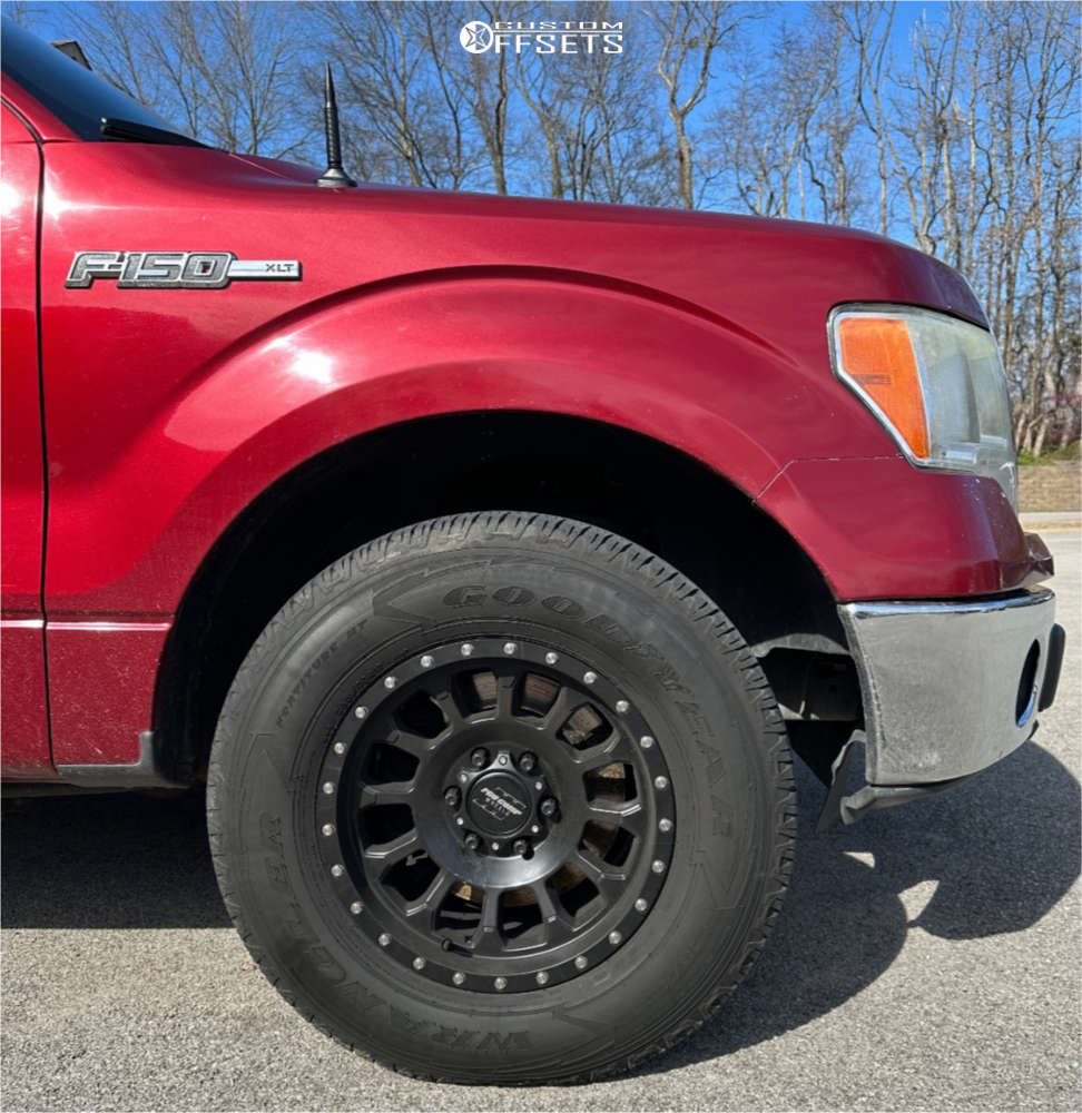 2014 Ford F-150 with 17x8.5 0 Pro Comp Series 34 and 265/70R17 Goodyear ...