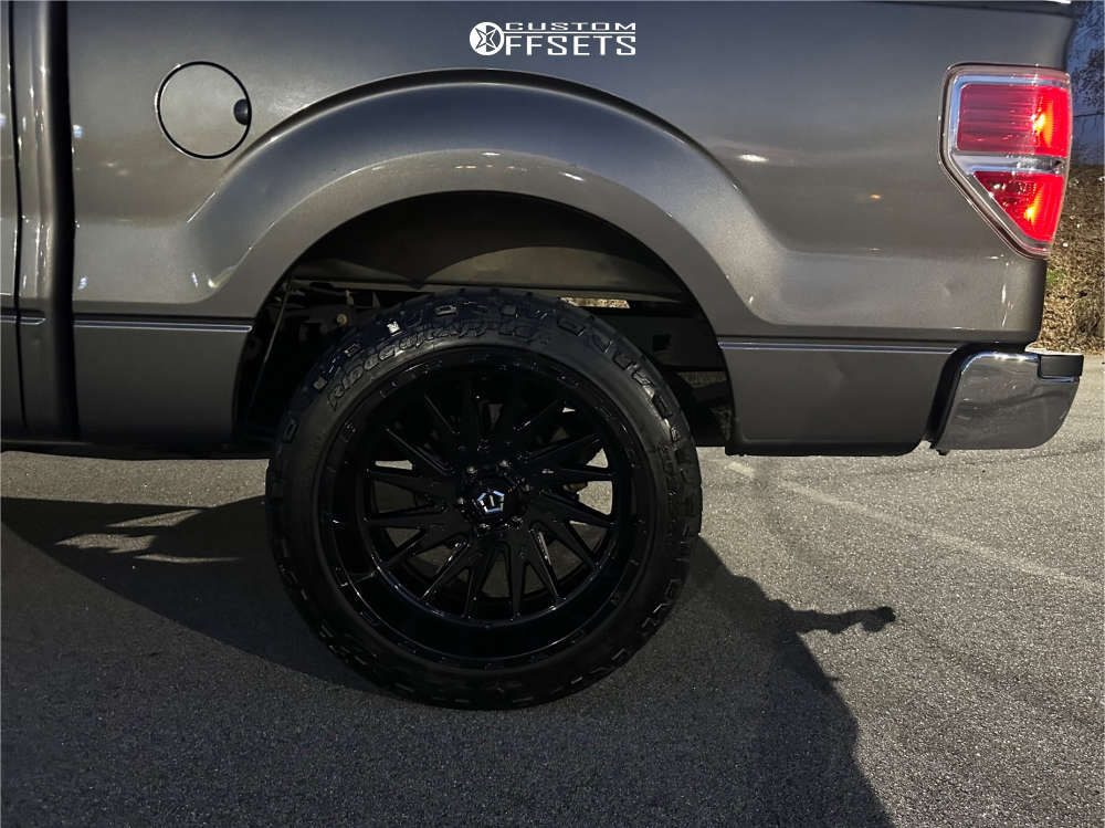 2014 Ford F-150 with 22x12 -44 TIS 547b and 33/12.5R22 Nitto Ridge ...