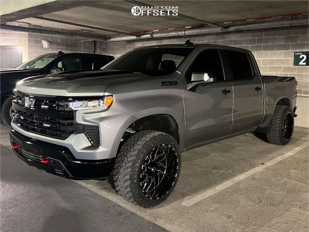 2024 Chevrolet Silverado 1500 with 22x12 44 TIS 544bm and 33 12.5R22 Atturo Trail Blade Mt and Stock Custom Offsets