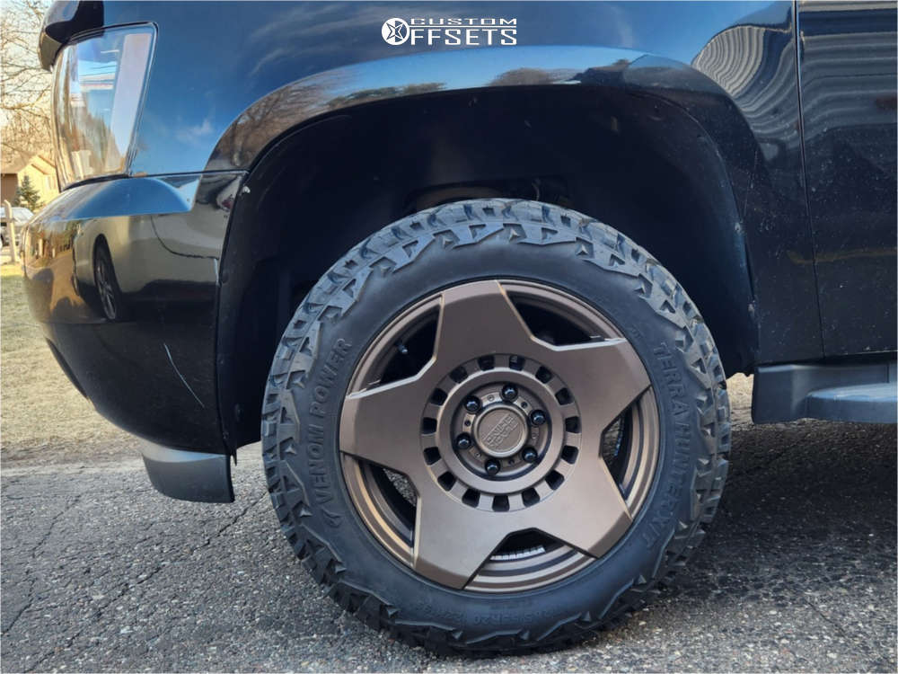 2011 Chevrolet Suburban 1500 with 20x9 12 Black Rhino Muzzle and 285 ...