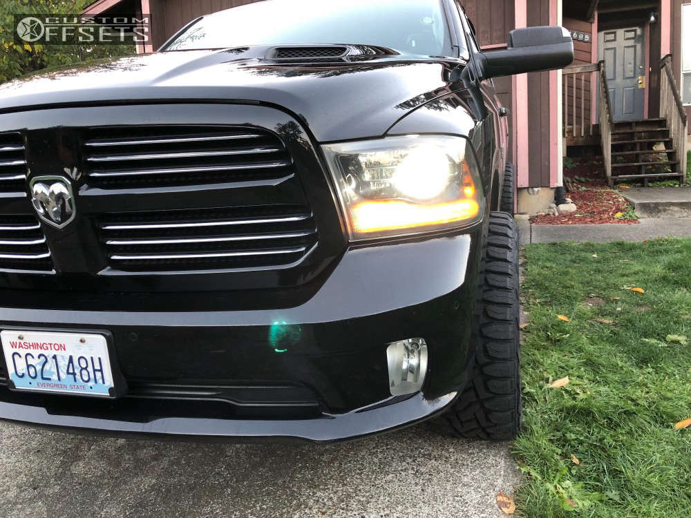 2014 Ram 1500 with 20x10 -24 Fuel Coupler and 33/12.5R20 Toyo Tires ...