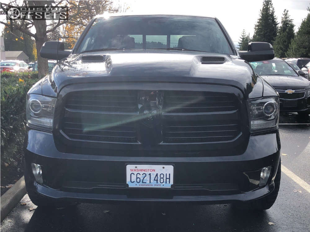 2014 Ram 1500 with 20x10 -24 Fuel Coupler and 33/12.5R20 Toyo Tires ...