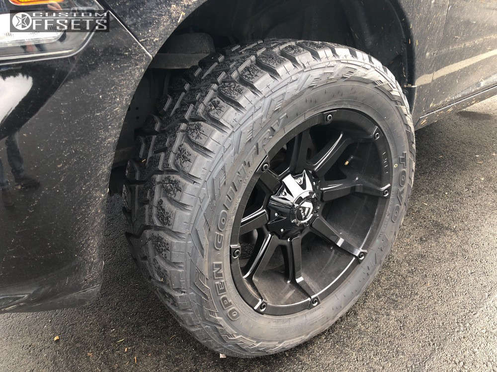 2014 Ram 1500 with 20x10 -24 Fuel Coupler and 33/12.5R20 Toyo Tires ...