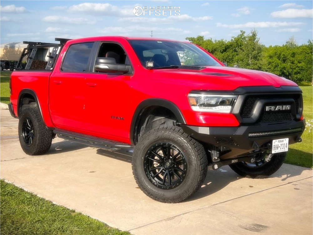 2022 Ram 1500 with 20x9 1 Fuel Rebel and 35/12.5R20 Falken Wildpeak ...