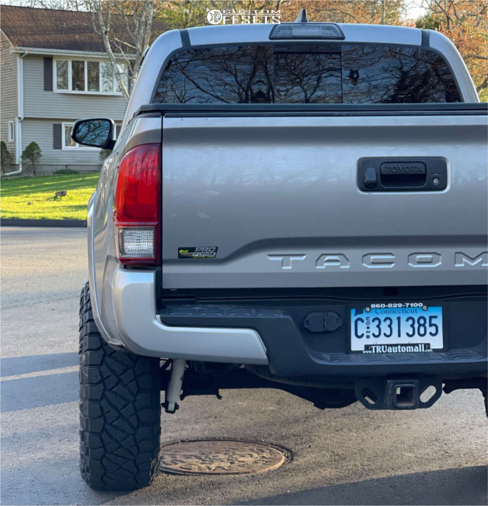 2017 Toyota Tacoma with 17x8.5 -12 RRW Rr7-h and 285/70R17 Nitto Ridge Grappler and Suspension ...