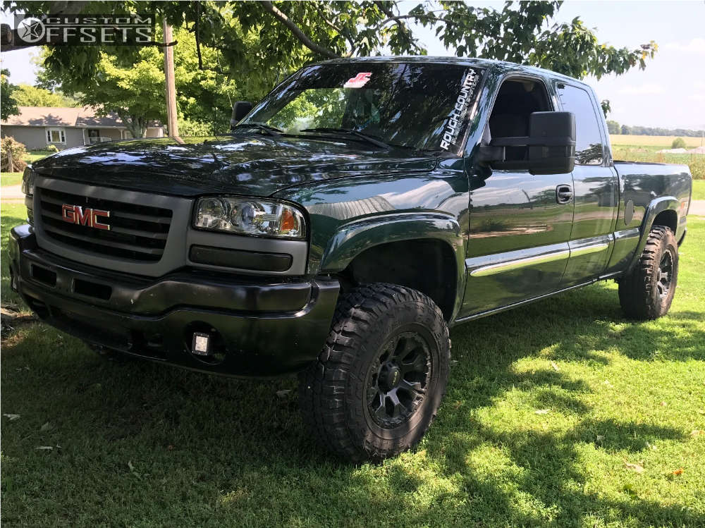 2004 GMC Sierra 1500 with 16x9 -12 Helo He878 and 285/75R16 Federal ...