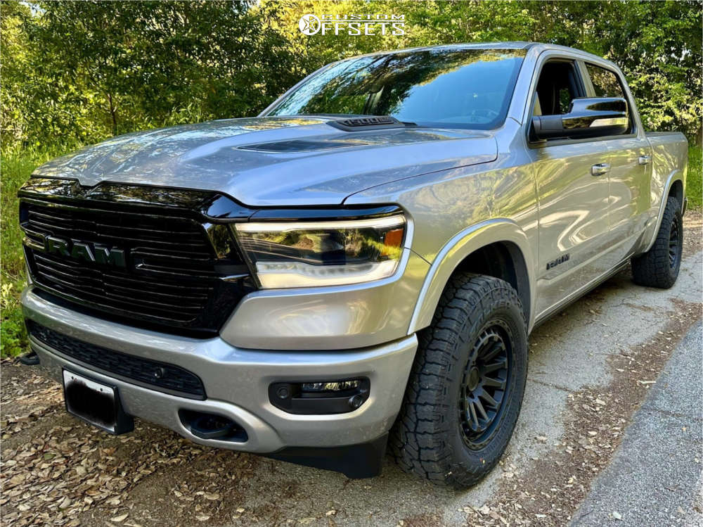 2021 Ram 1500 with 18x9.5 -18 Black Rhino Raid and 285/65R18 Falken ...