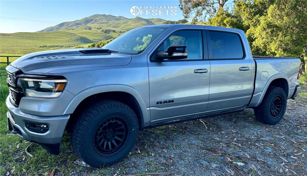 2021 Ram 1500 with 18x9.5 -18 Black Rhino Raid and 285/65R18 Falken ...