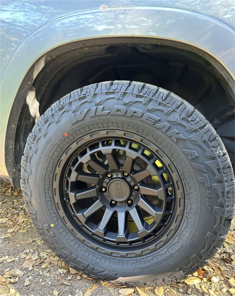 2021 Ram 1500 with 18x9.5 -18 Black Rhino Raid and 285/65R18 Falken ...