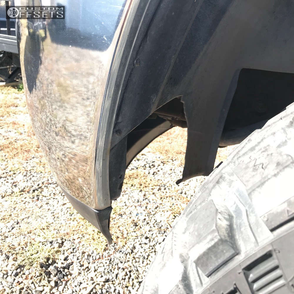 2011 Ram 3500 with 18x9 -12 Method Con6 and 305/70R18 Cooper Discoverer ...