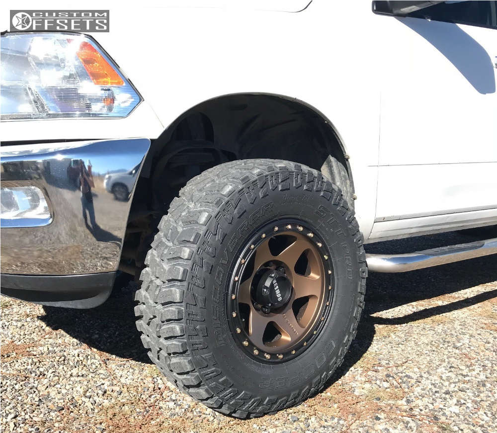 2011 Ram 3500 with 18x9 -12 Method Con6 and 305/70R18 Cooper Discoverer ...
