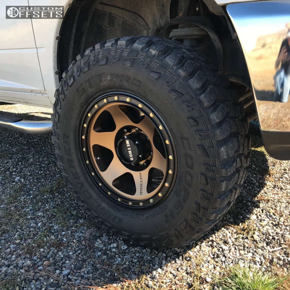 2011 Ram 3500 with 18x9 -12 Method Con6 and 305/70R18 Cooper Discoverer ...