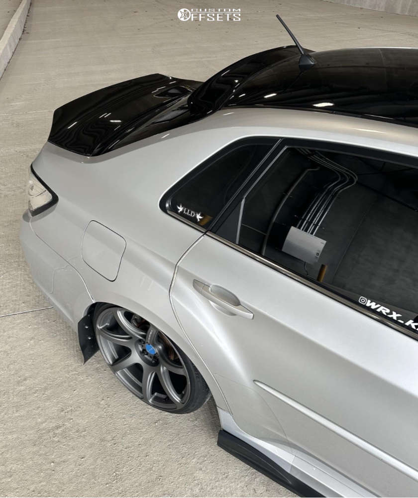 2011 Subaru Impreza with 18x9.5 38 Work Emotion T7r and 215/40R18 Delinte Dh2 and Air Suspension ...