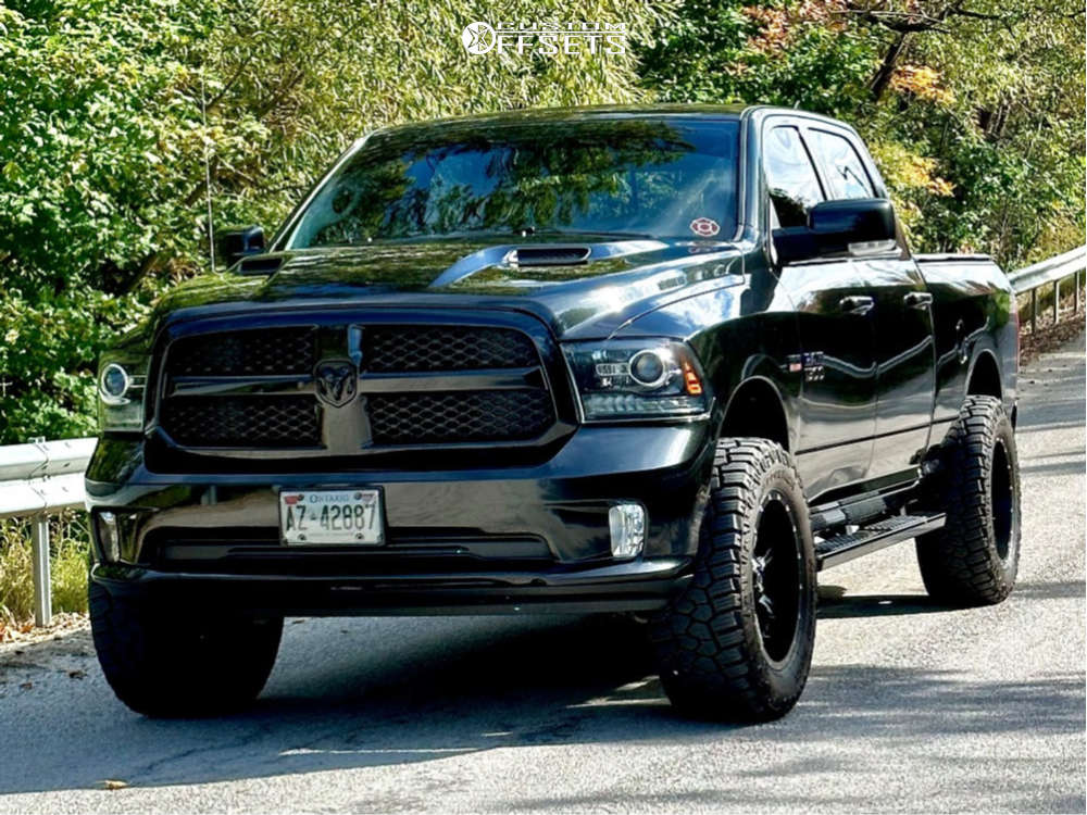 2018 Ram 1500 with 20x10 -24 Fuel Nutz and 35/12.5R20 Cooper Discoverer ...
