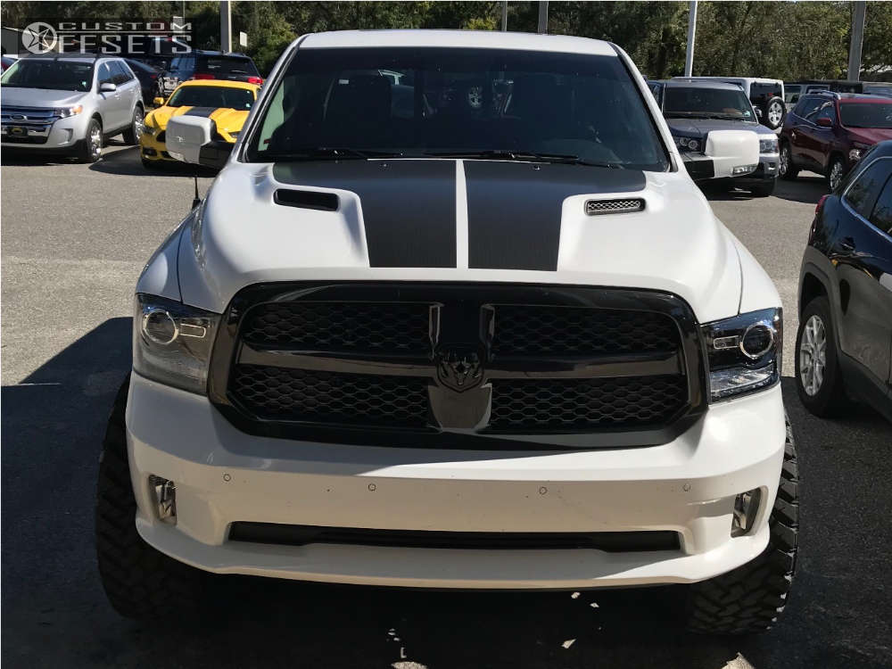 2017 Ram 1500 with 20x12 -43 Fuel Titan and 37/13.5R20 Nitto Trail ...