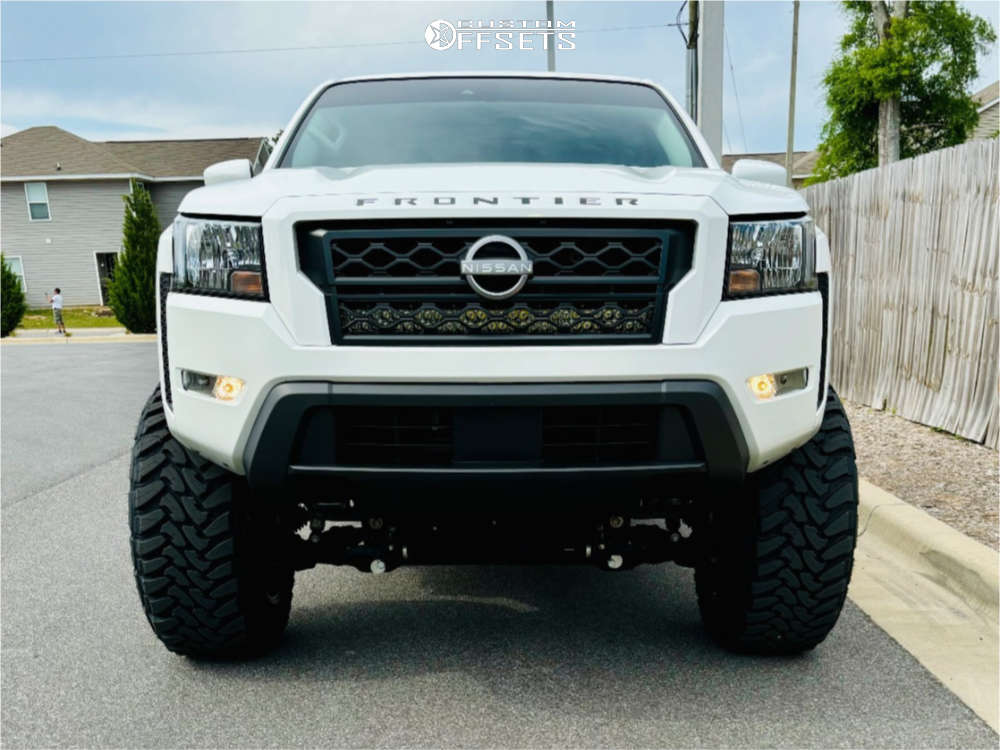 2022 Nissan Frontier with 20x12 -44 Anthem Off-Road Avenger and 35/12 ...