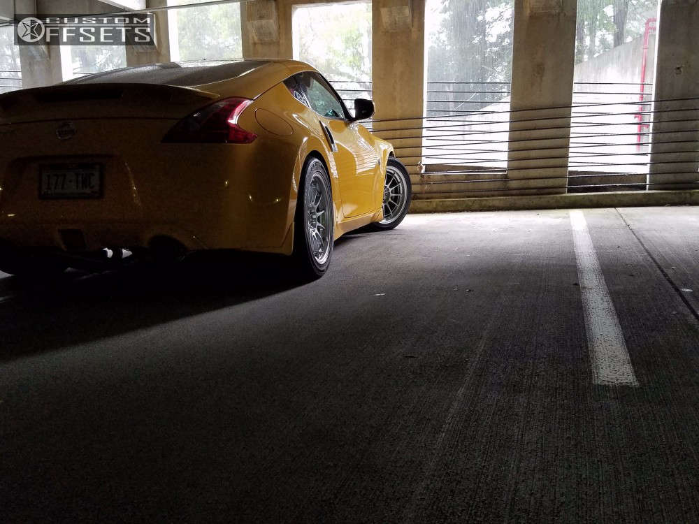 2009 Nissan 370Z with 18x9.5 28 Enkei Nt03 and 275/40R18 Bridgestone Re ...