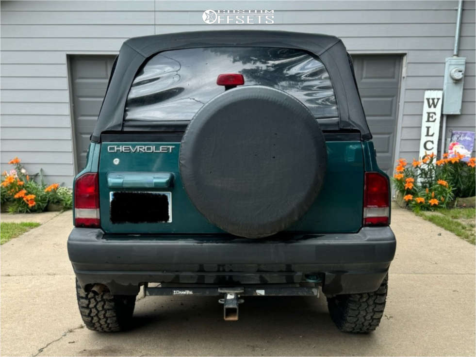 1998 Chevrolet Tracker with 15x7 -6 Vision D Window and 235/75R15 ...