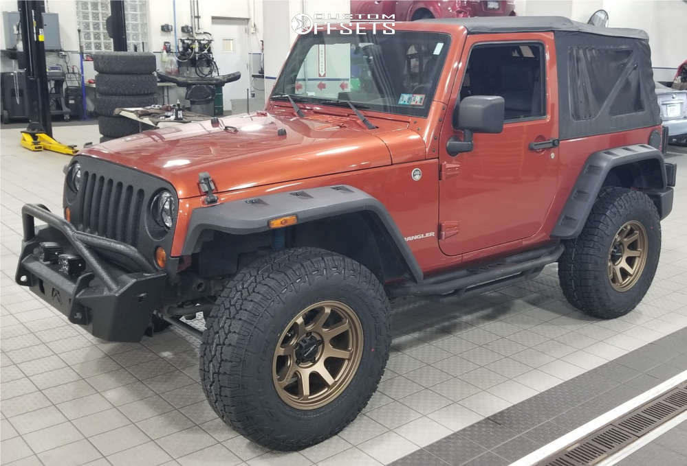 2009 Jeep Wrangler with 17x9 -12 Vision Flow and 285/70R17 Falken ...