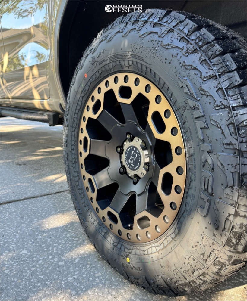 2023 GMC Canyon with 18x9 12 Black Rhino Warlord and 275/65R18 Falken ...