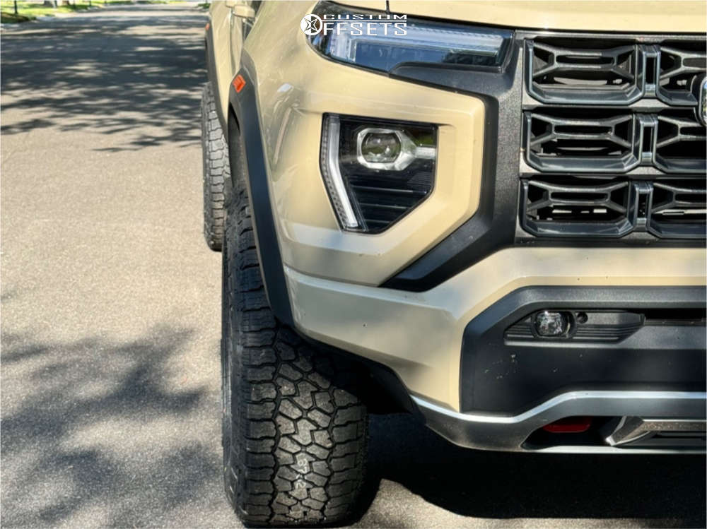 2023 GMC Canyon with 18x9 12 Black Rhino Warlord and 275/65R18 Falken ...