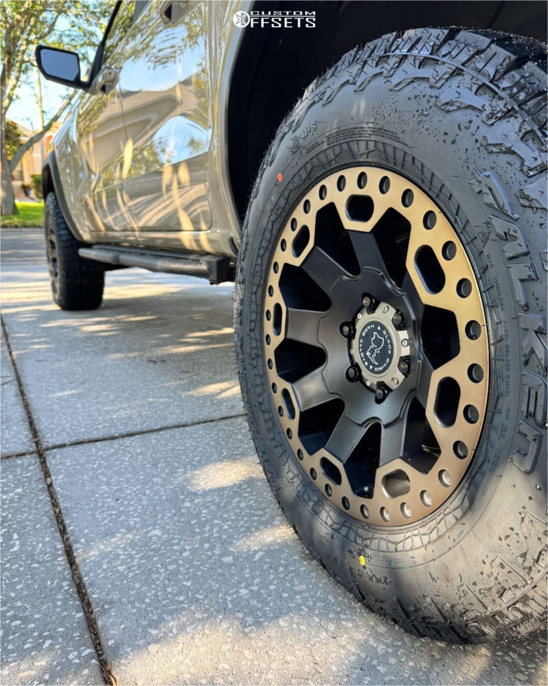 2023 GMC Canyon with 18x9 12 Black Rhino Warlord and 275/65R18 Falken ...