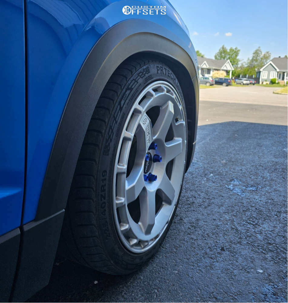 2022 Volkswagen Taos with 19x8.5 45 Rotiform Kb1 and 225/40R19 ...