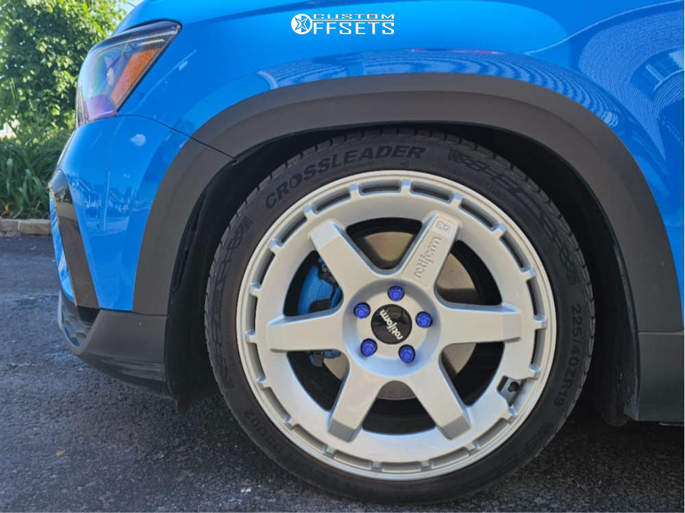 2022 Volkswagen Taos with 19x8.5 45 Rotiform Kb1 and 225/40R19 ...