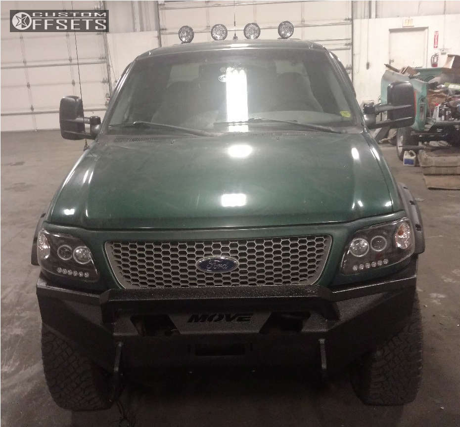 1999 Ford F-150 with 20x9 -12 Panther Offroad 578 and 305/55R20 Atturo ...