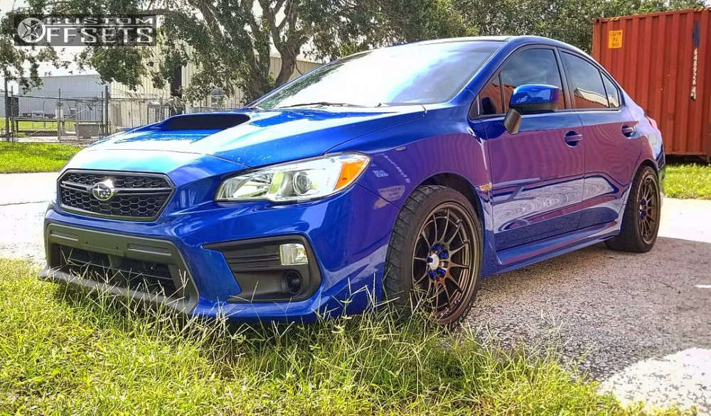 2017 Subaru WRX STI with 18x9.5 27 Enkei Nt03 and 255/35R18 Toyo Tires ...