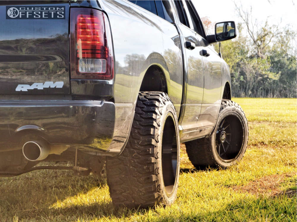2014 Ram 1500 with 20x12 -44 American Truxx Striker and 33/12.5R20 Haida Mud Champ and Leveling ...